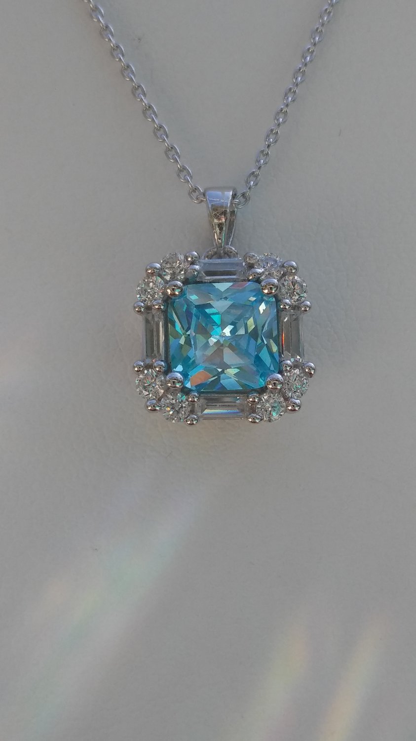 Sterling Silver Square Aquamarine CZ with White CZ Baguettes Pendant ...