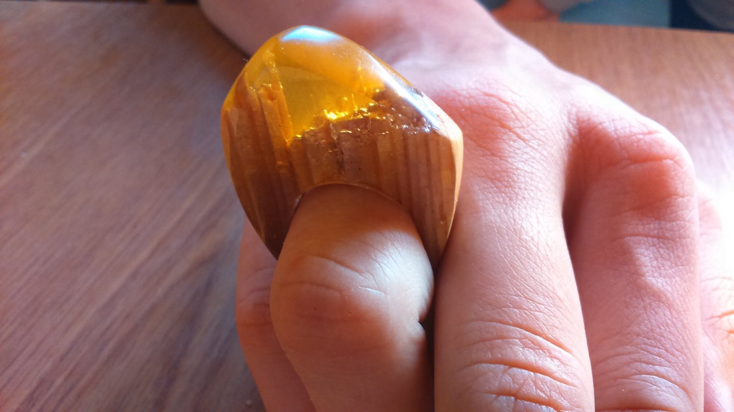Amber color resin and wood ring