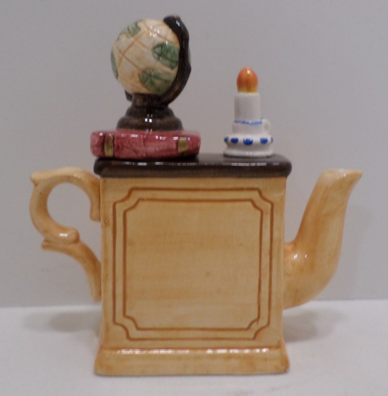 Vintage Teapot Porcelain Desk with Globe Candle and Books
