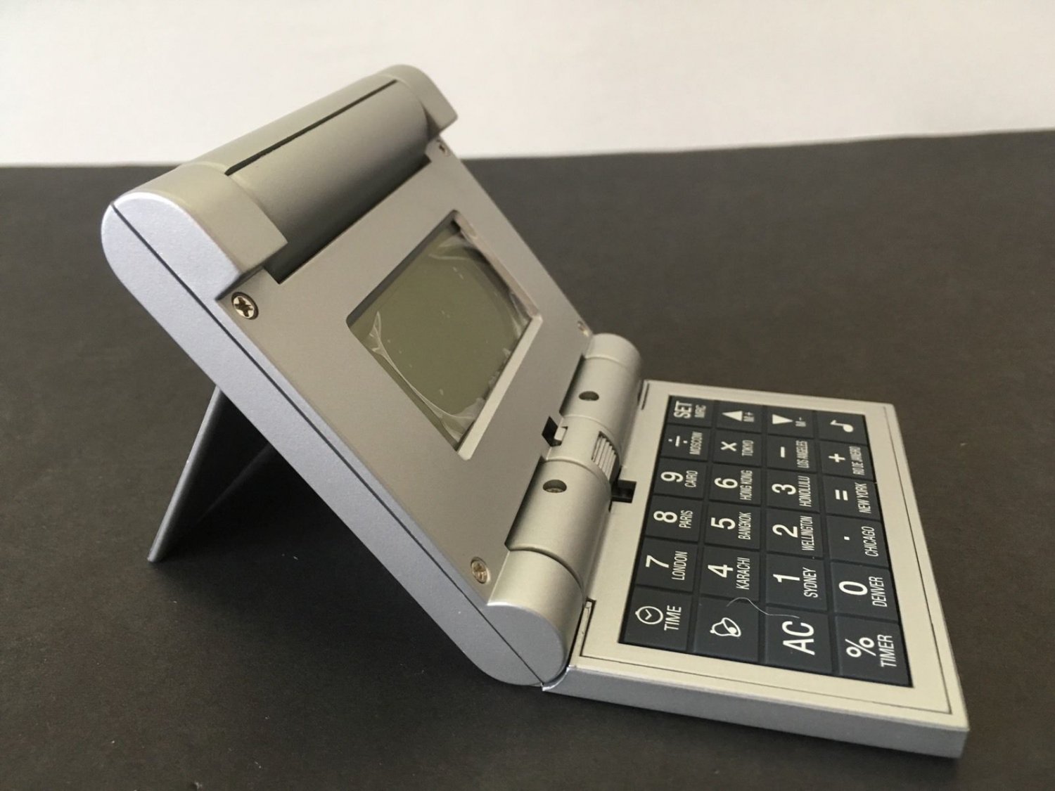 New Double Press-Up Calculator Calendar World Clock Alarm Travel Flip up