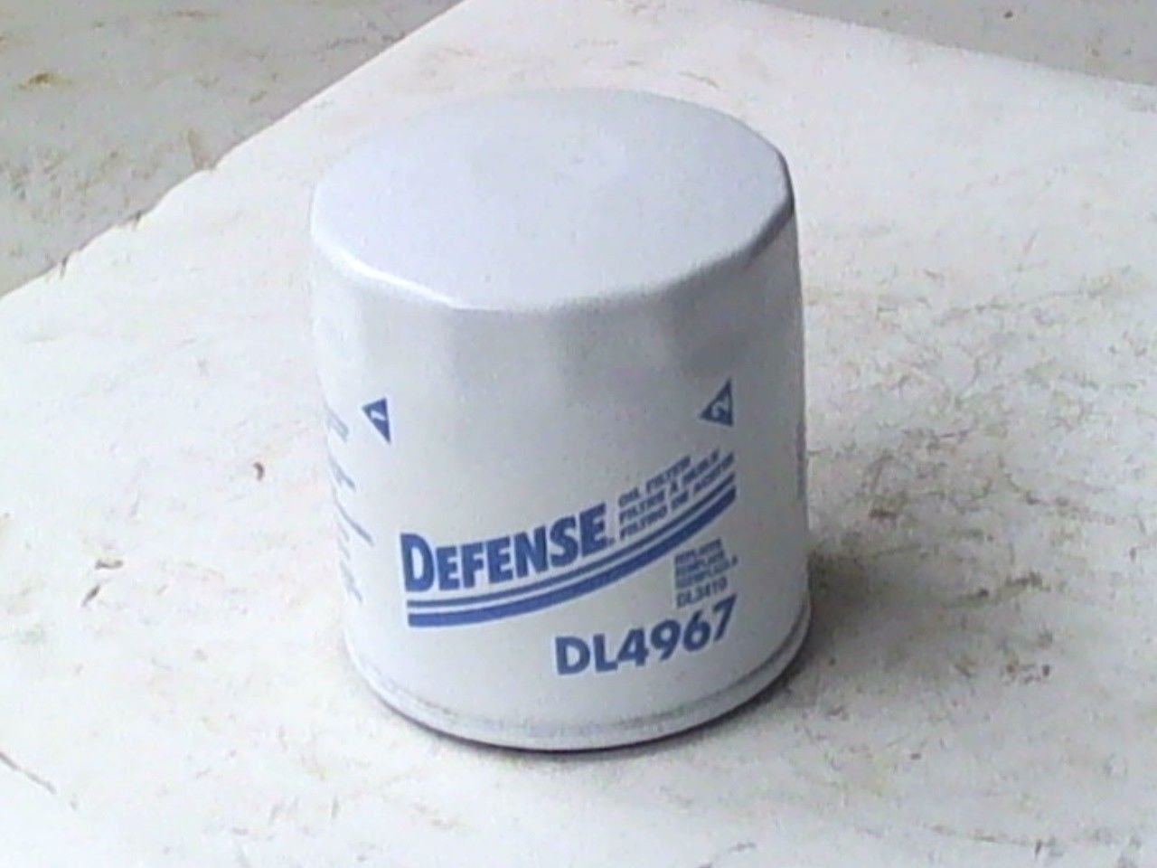 Defense DL4967 Engine Oil Filter - Spin-On Full Flow for Suzuki Toyota Geo