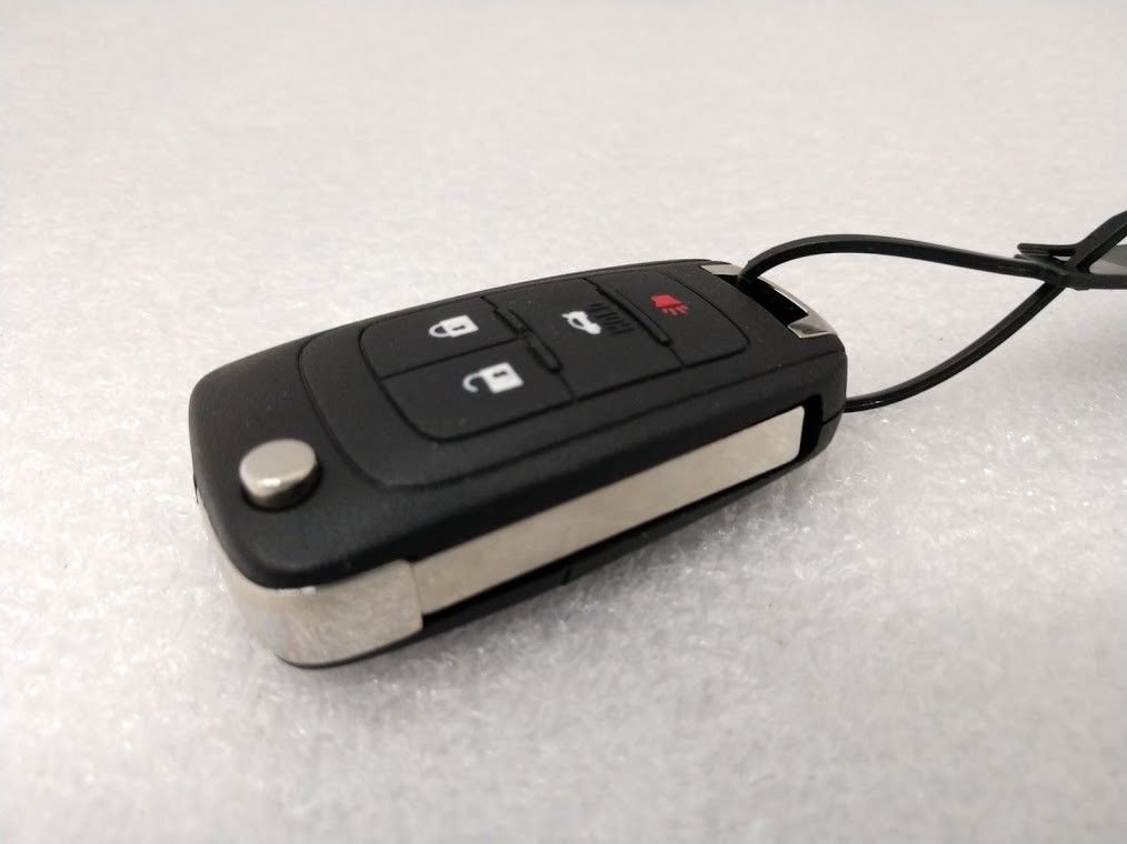 GM 2010+ OEM keyless entry flip fob +key blank. Door lock, unlock hatch ... GM 2010+ OEM keyless entry flip fob +key blank. Door lock, unlock hatch ...