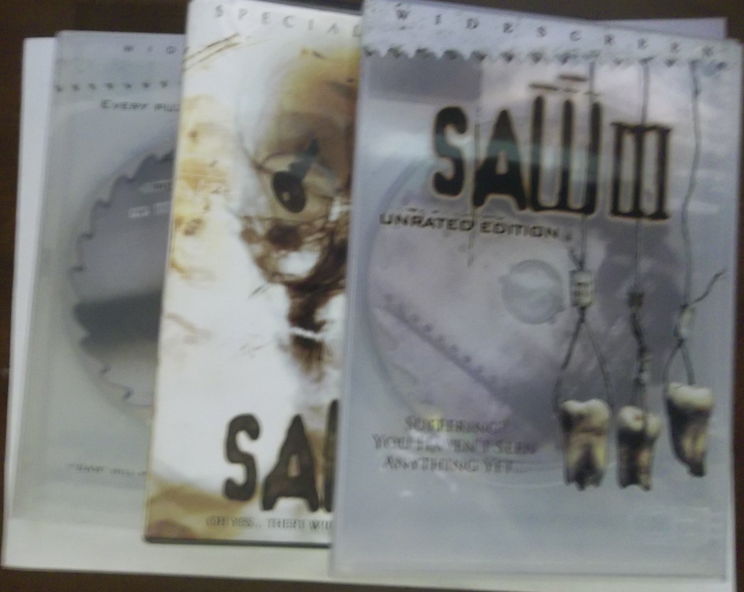 SAW TRILOGY, 5 DISC SET, DONNIE WAHLBERG, CARY ELWES, PLUS FREE GIFT