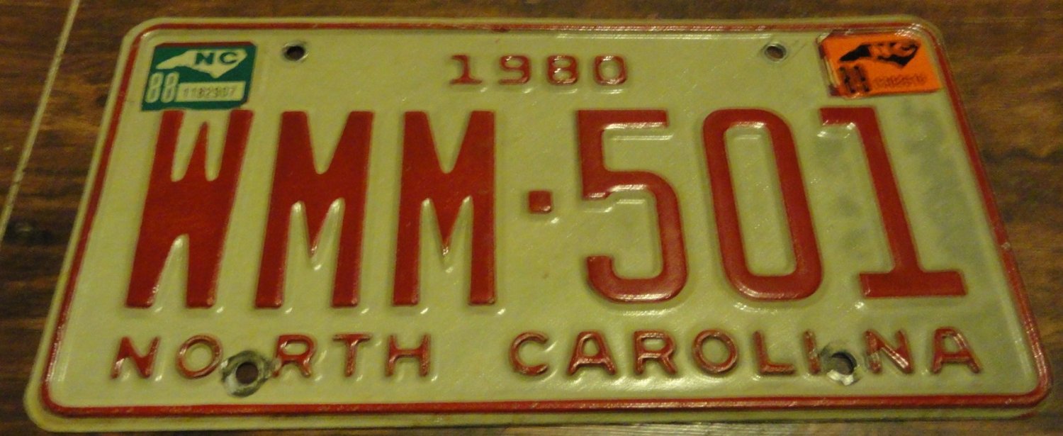 1980 WMM 501 North Carolina license plate with 1988 1989 stickers
