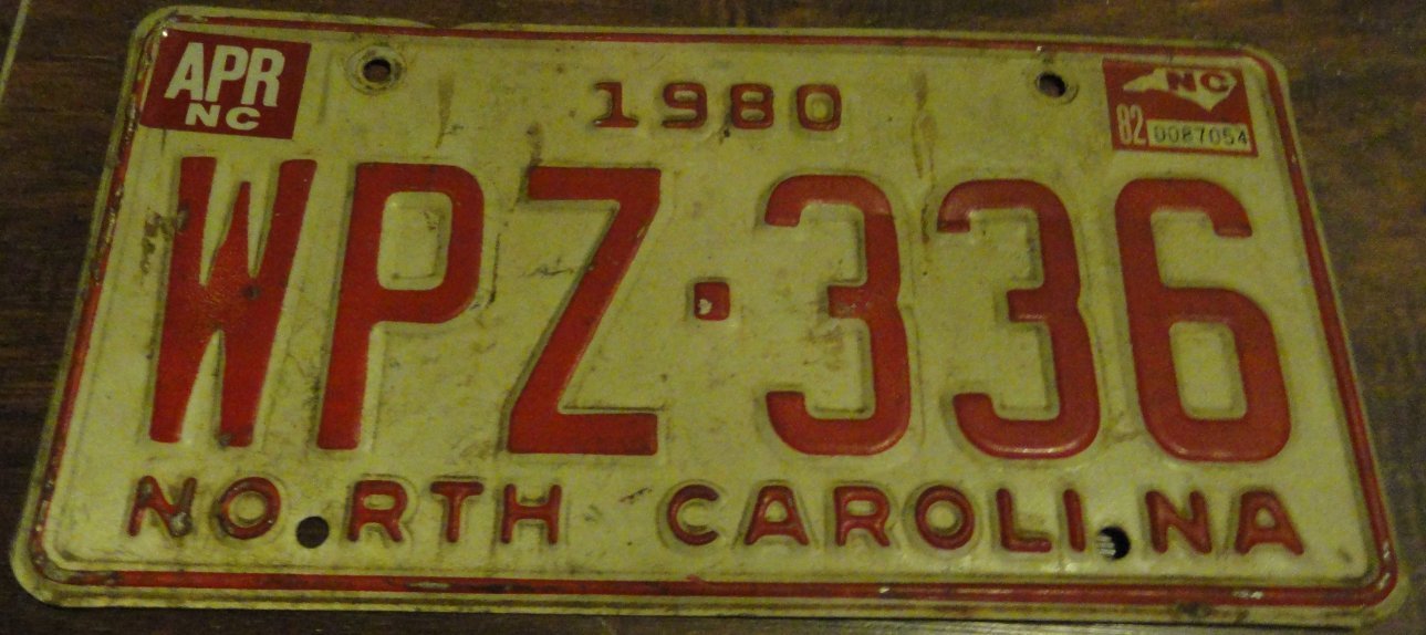 1980 WPZ 336 North Carolina license plate with April 1982 stickers