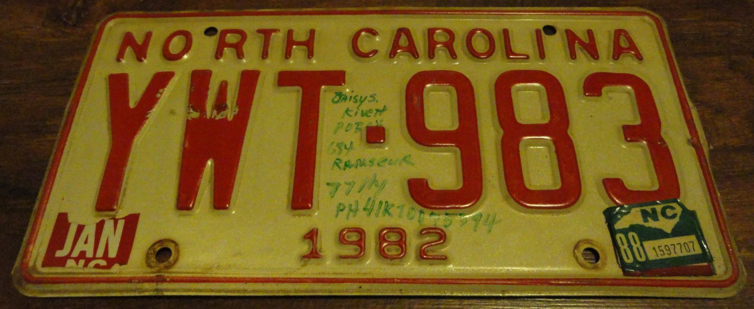 1982 YWT 983 North Carolina license plate with January 1988 stickers