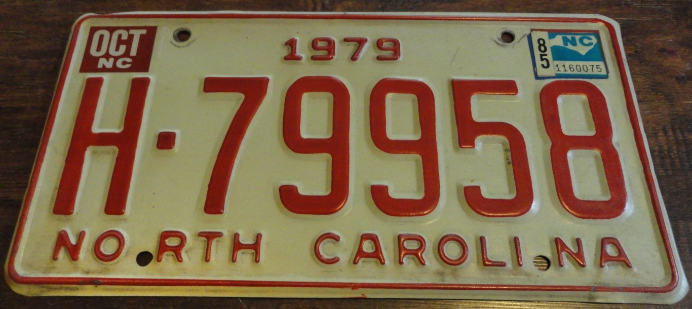 1979 H 79958 North Carolina license plate with October 1985 stickers