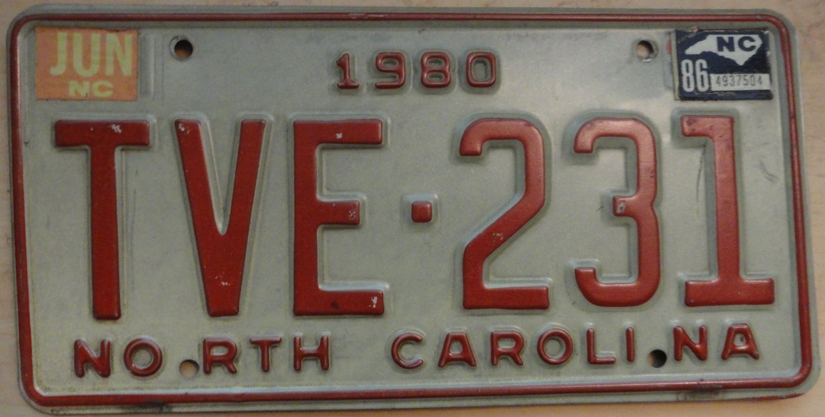 1980 North Carolina license plate TVE 231 with June 1986 stickers