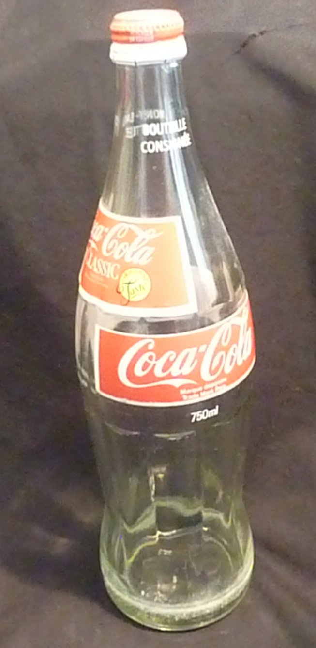 2 Different Coca Cola Bottles 750ml
