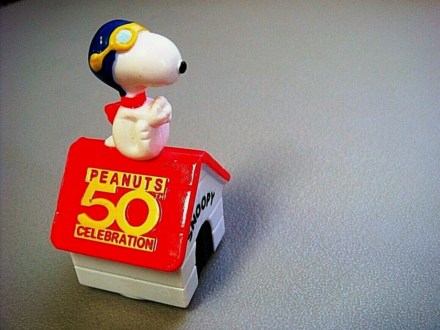 SNOOPY on top of his doghouse wearing goggles - 50th Anniversary!