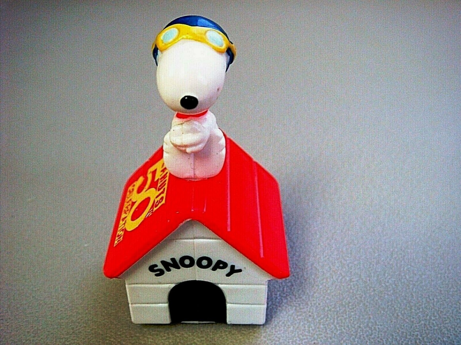 SNOOPY on top of his doghouse wearing goggles - 50th Anniversary!
