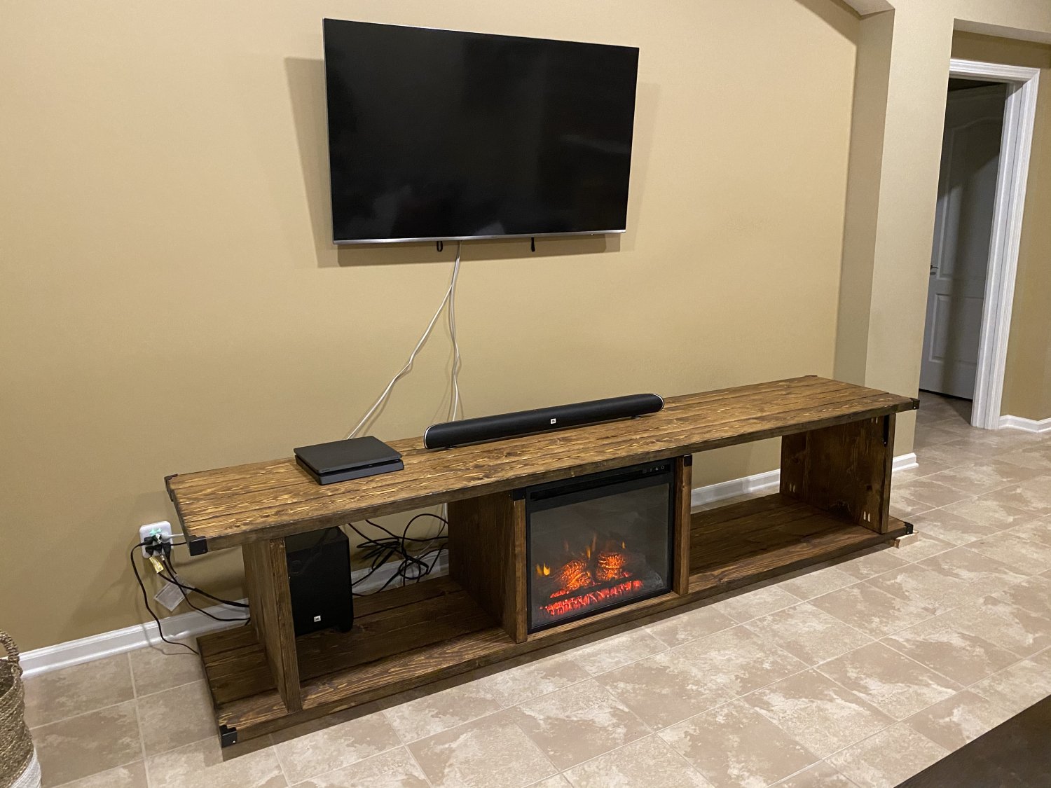 Giant entertainment center with fireplace