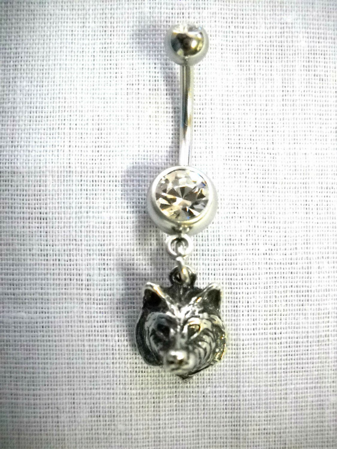 RAISED WOLF HEAD FACE LEADER OF THE PACK 14g CLEAR CZ BARBELL BELLY RING