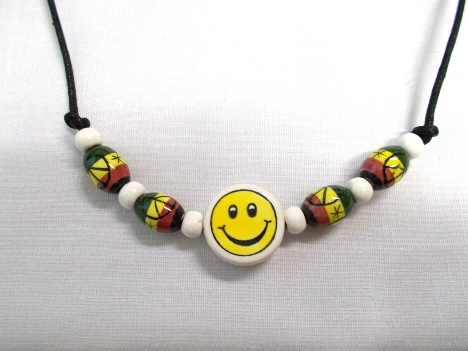 CERAMIC SMILEY FACE DISC w RASTA PEACE SIGN & WHITE BEADS TIE ANKLET OR ...