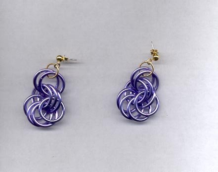 Avon Loop De Loop pierced earrings- purple