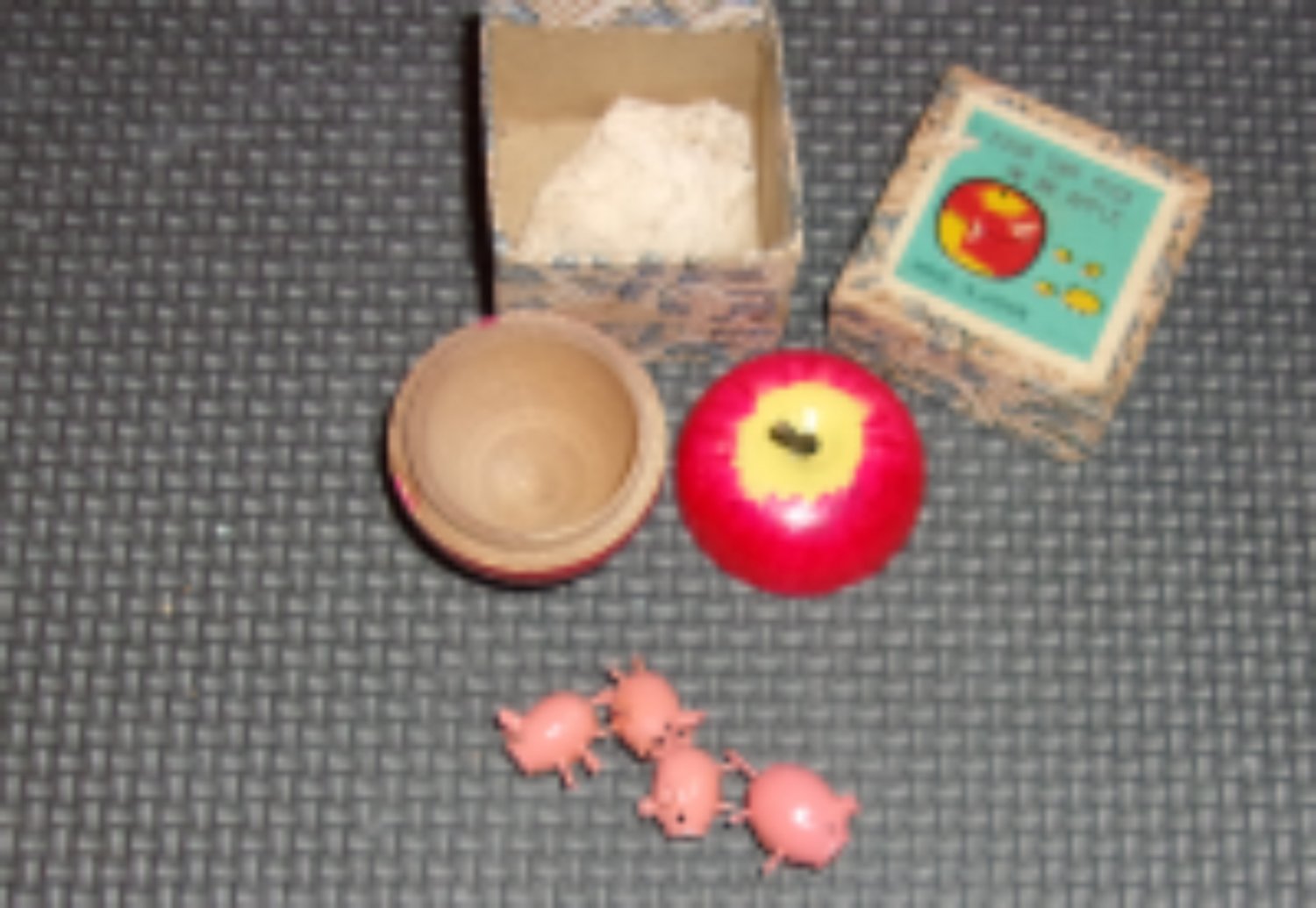 Four Tiny Pigs in an Apple Four Tiny Pigs in an Apple