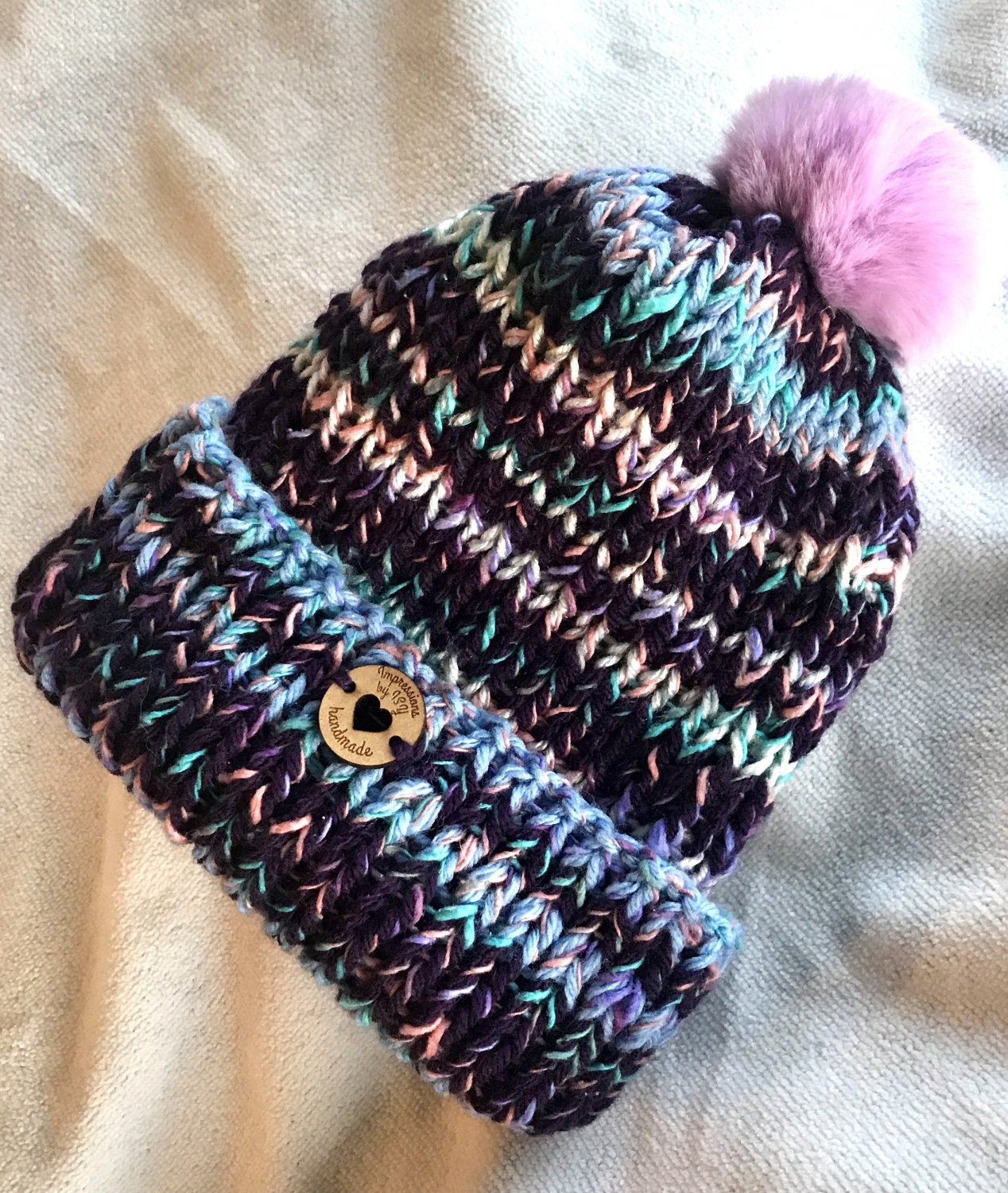Handcrafted knit hat silk blend multicolored removable Pom Pom
