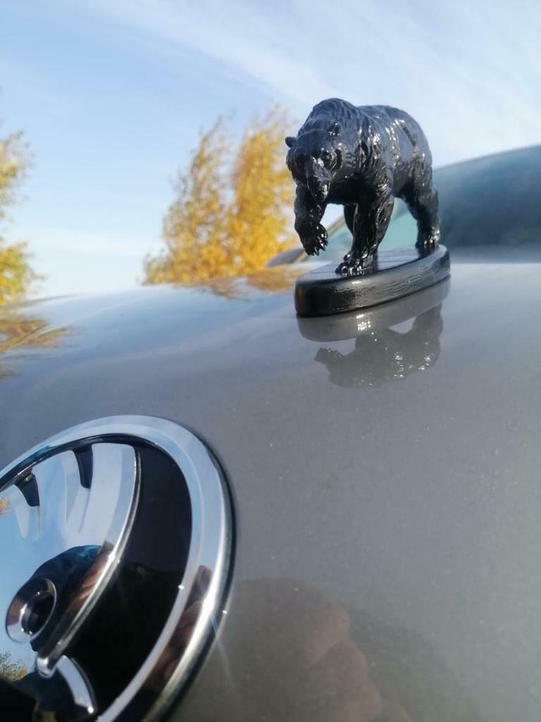 Walking bear hood ornament (car radiator mascot)