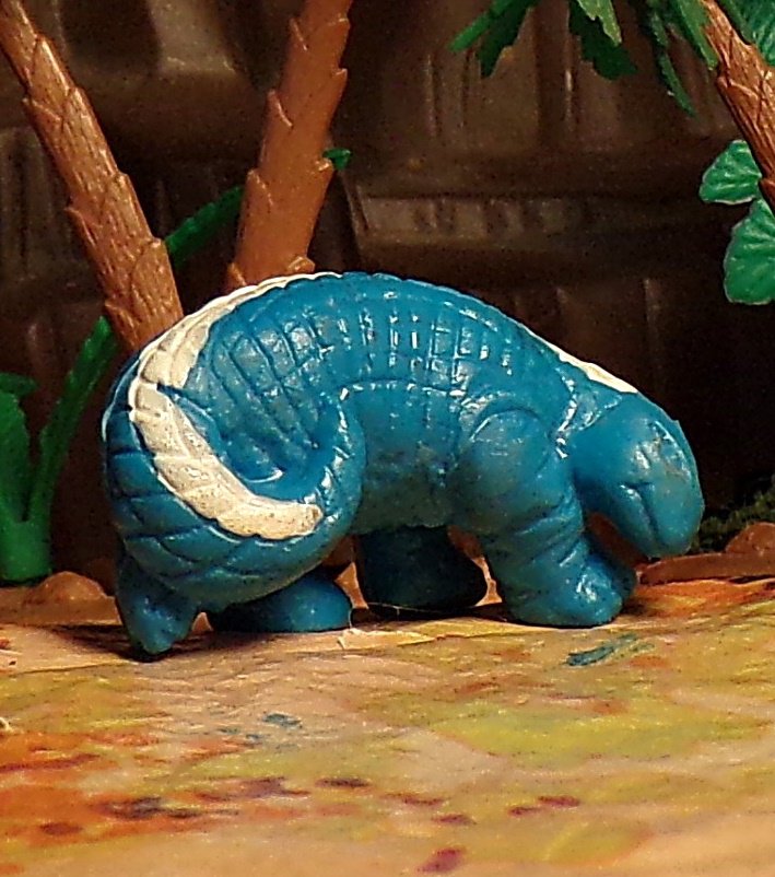 1987 Panosh (aka Dino Mites) Caricature #33 Blue Armored Dinosaur (5-3-22)