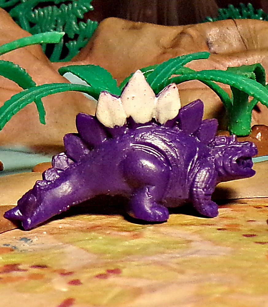 1987 Panosh (aka Dino Mites) Caricature #13 Purple Stegosaurus (5-6-22)
