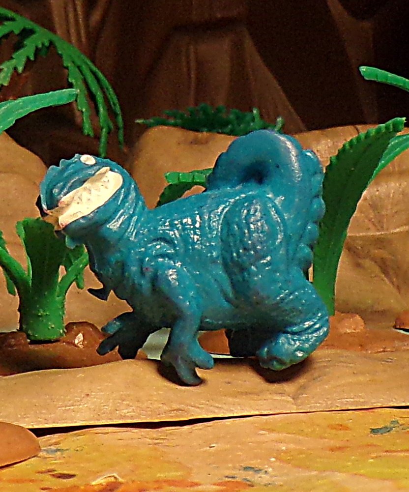 1987 Panosh (aka Dino Mites) Caricature #12 Blue Theropod (5-6-22)