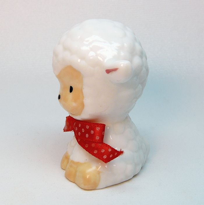 Vintage porcelain lamb figurine red bow