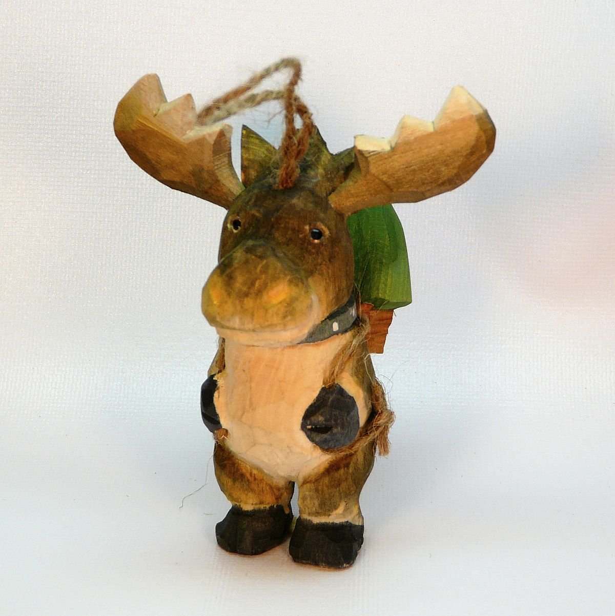 Hand carved wooden moose with backpack Christmas ornament country