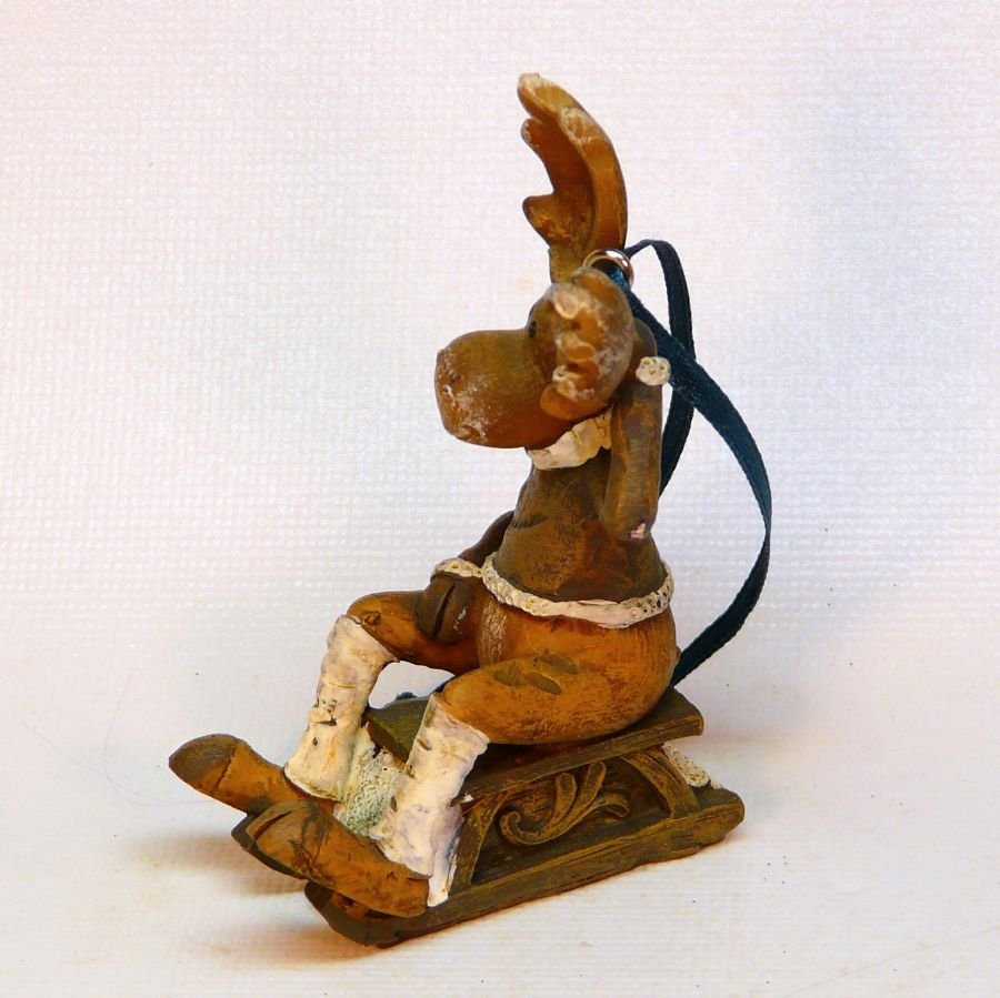 Moose on sled Christmas ornament