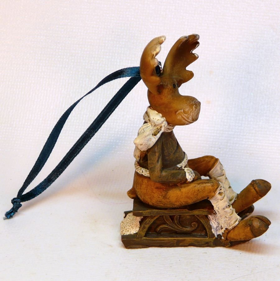 Moose on sled Christmas ornament