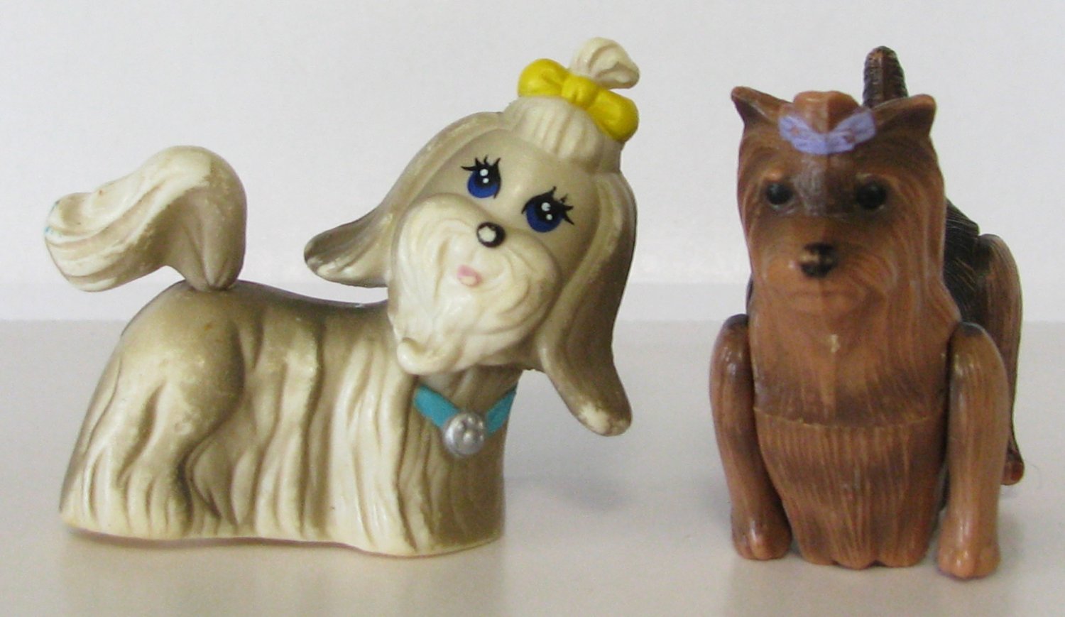 Shih Tzu and Terrier Miniature Plastic Dogs on Wheels Toys