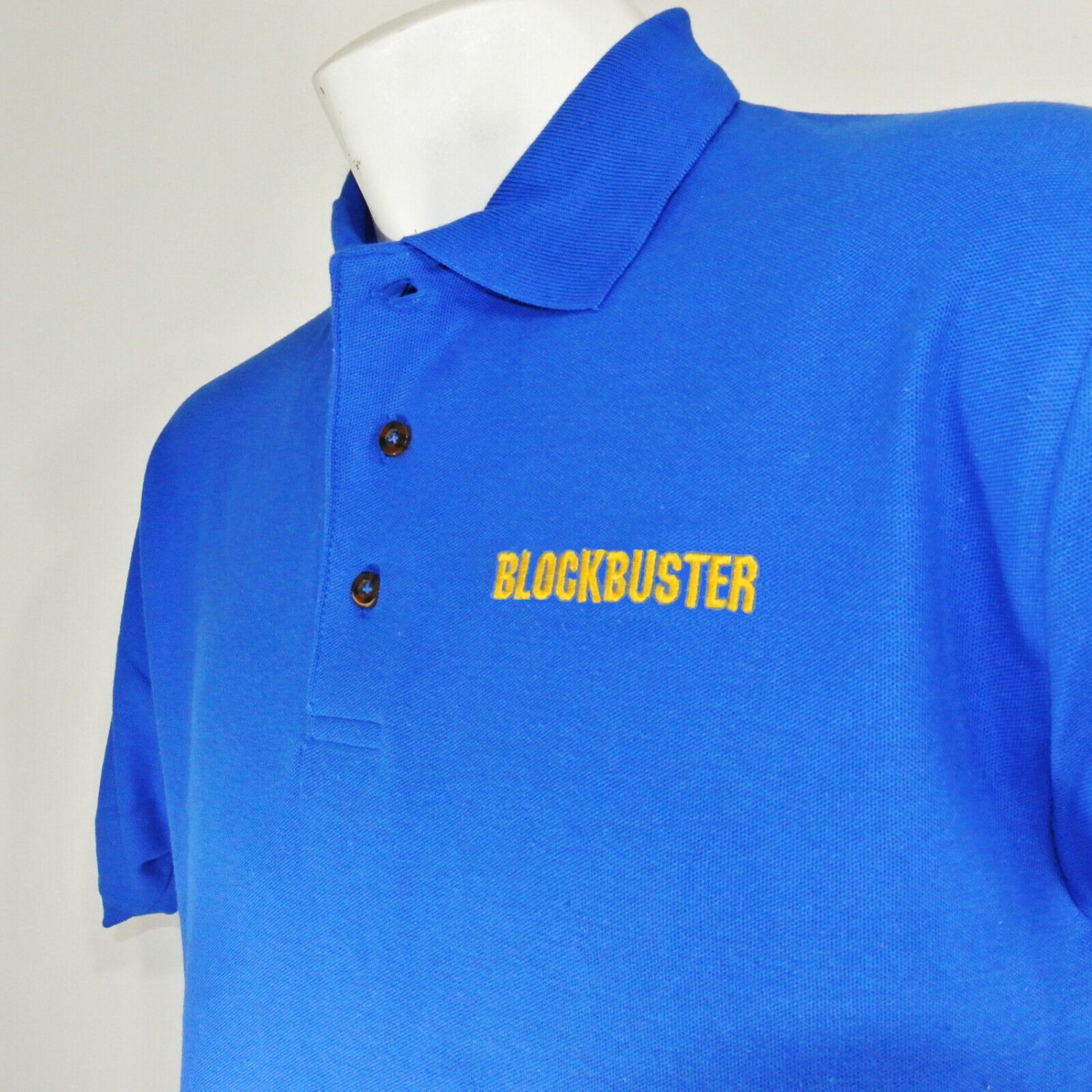 BLOCKBUSTER VIDEO Logo Text Employee Uniform Polo Shirt Blue Size M ...