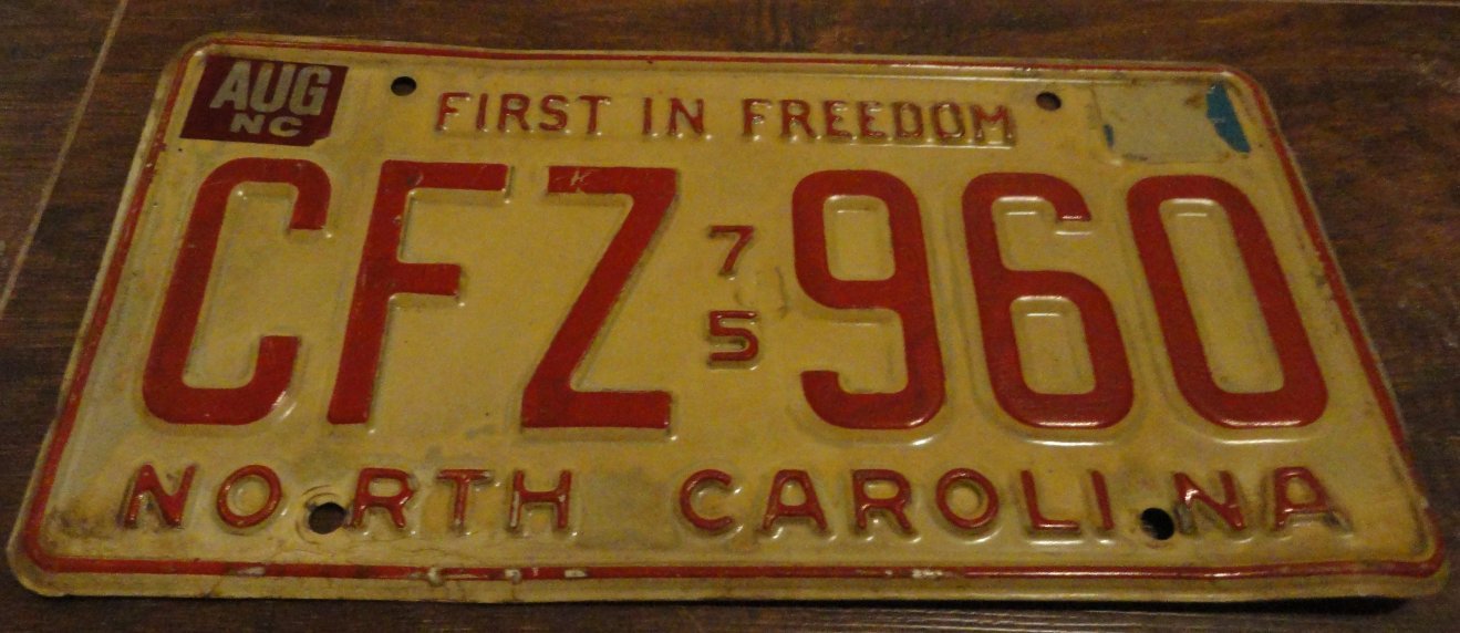 1975 CFZ 960 North Carolina license plate with August sticker