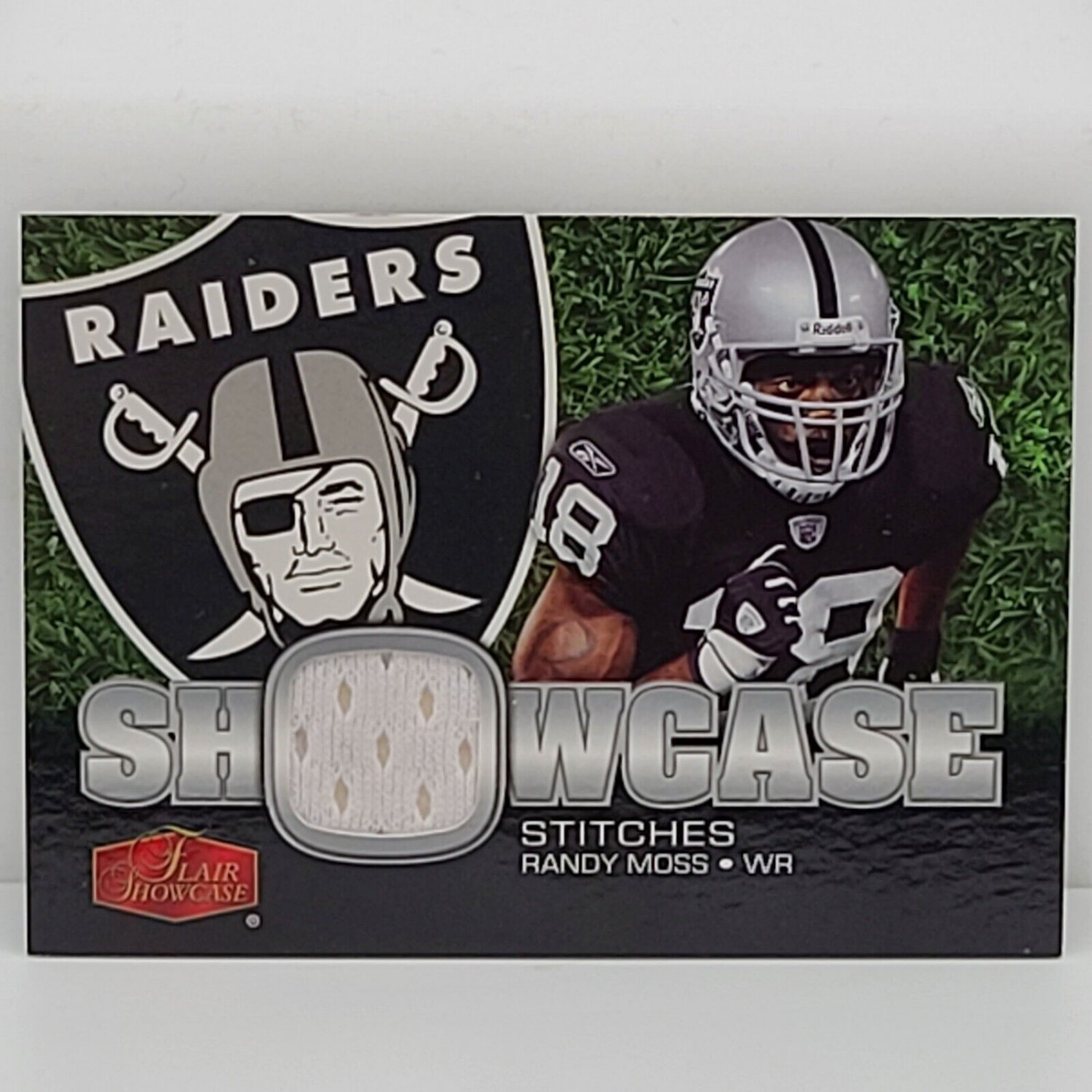 2006 Flair Showcase Randy Moss Game-Used Jersey Patch Card Raiders