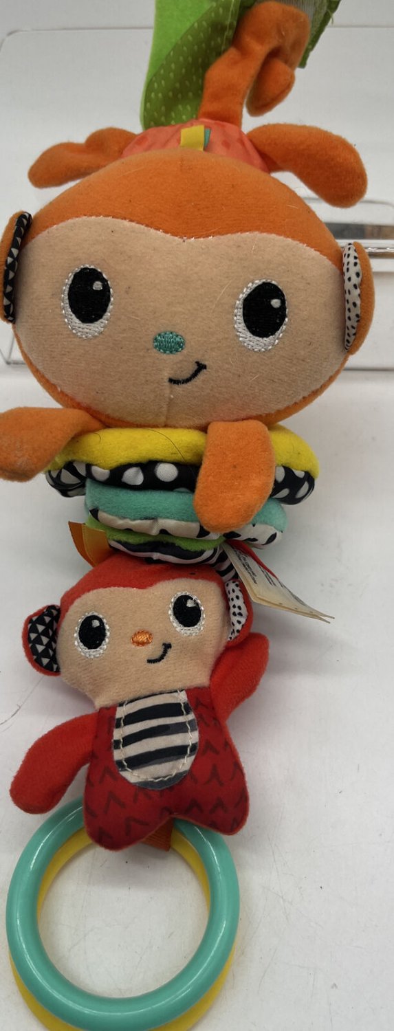 Infantino Hug and Tug Musical Monkey Baby Plush Toy Colorful Baby Toy ...