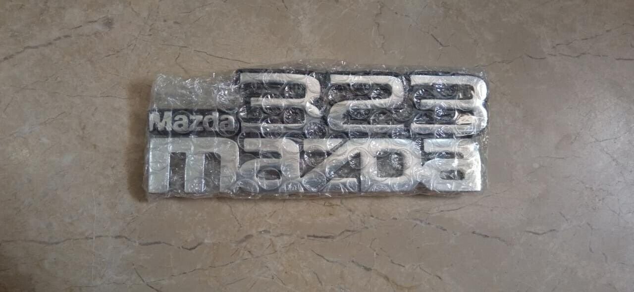 MAZDA 323 Diggi Emblem