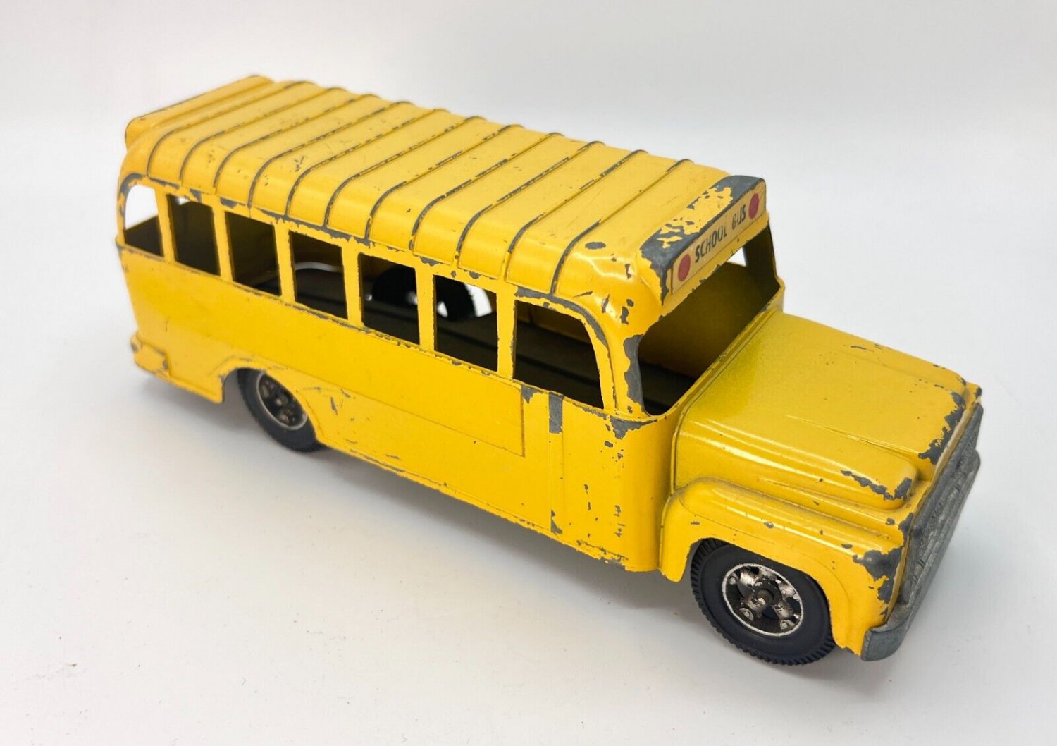 Vintage 1960's 9-inch Hubley Pressed Steel Yellow School Bus