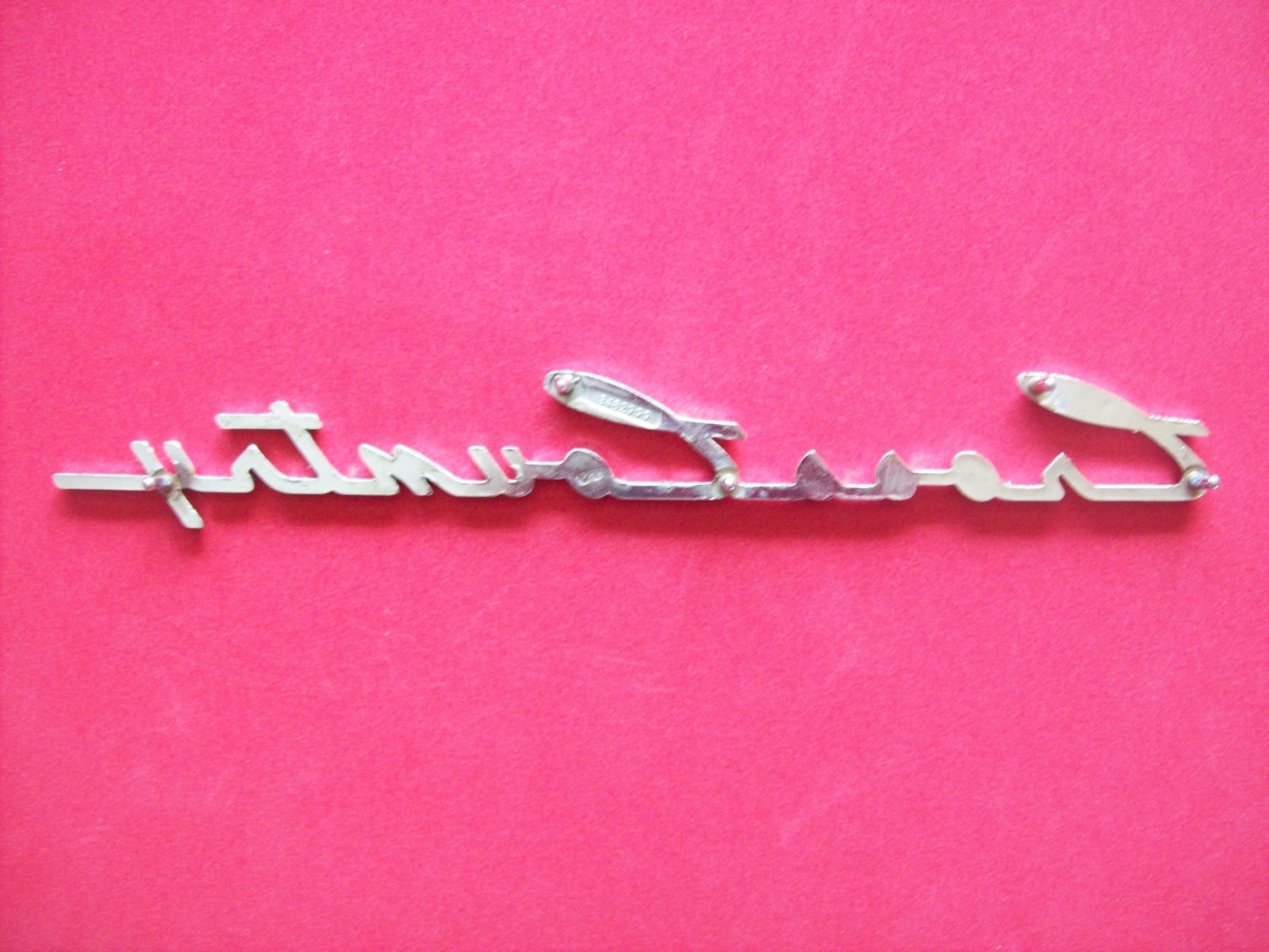 American Motors AMC Rambler Cross Country emblem ornament