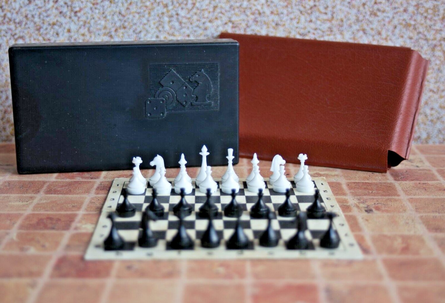 small vintage travel chess set with magnetic board in original case