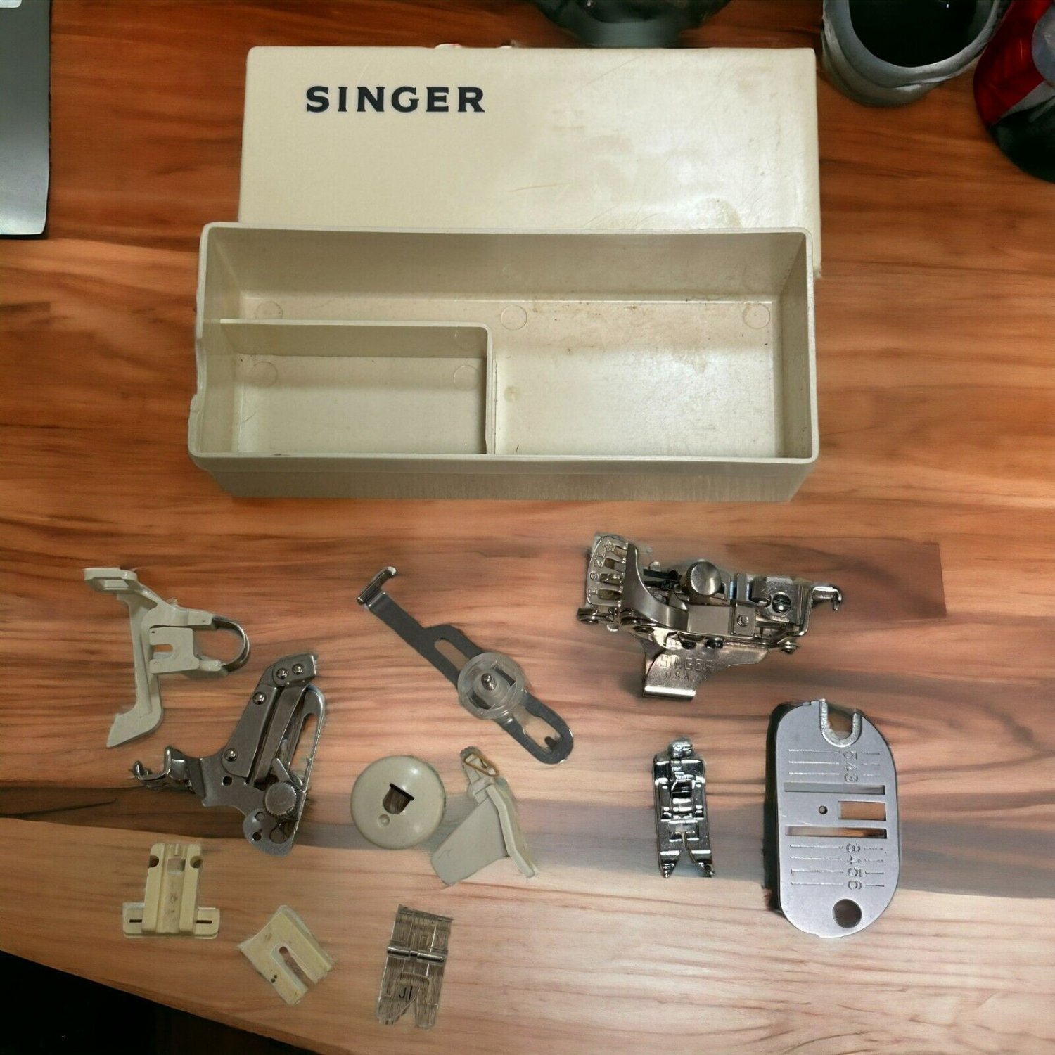 Vintage Singer Sewing Machine Attachments with White Singer Case