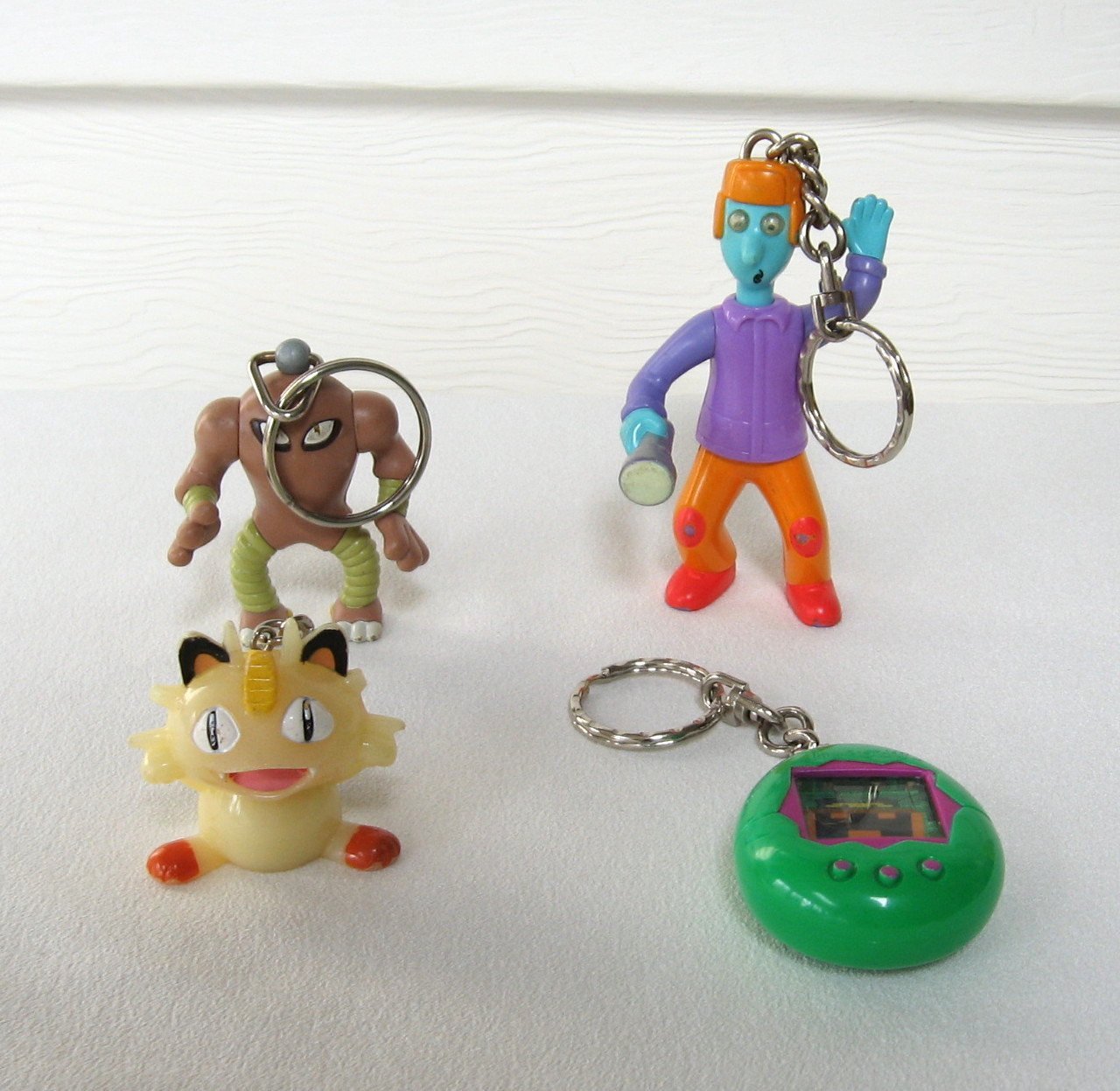 4 Keychain Toys Pokemon Meowth Hitmonlee Nintendo Tamagotchi Skeeter 1990s
