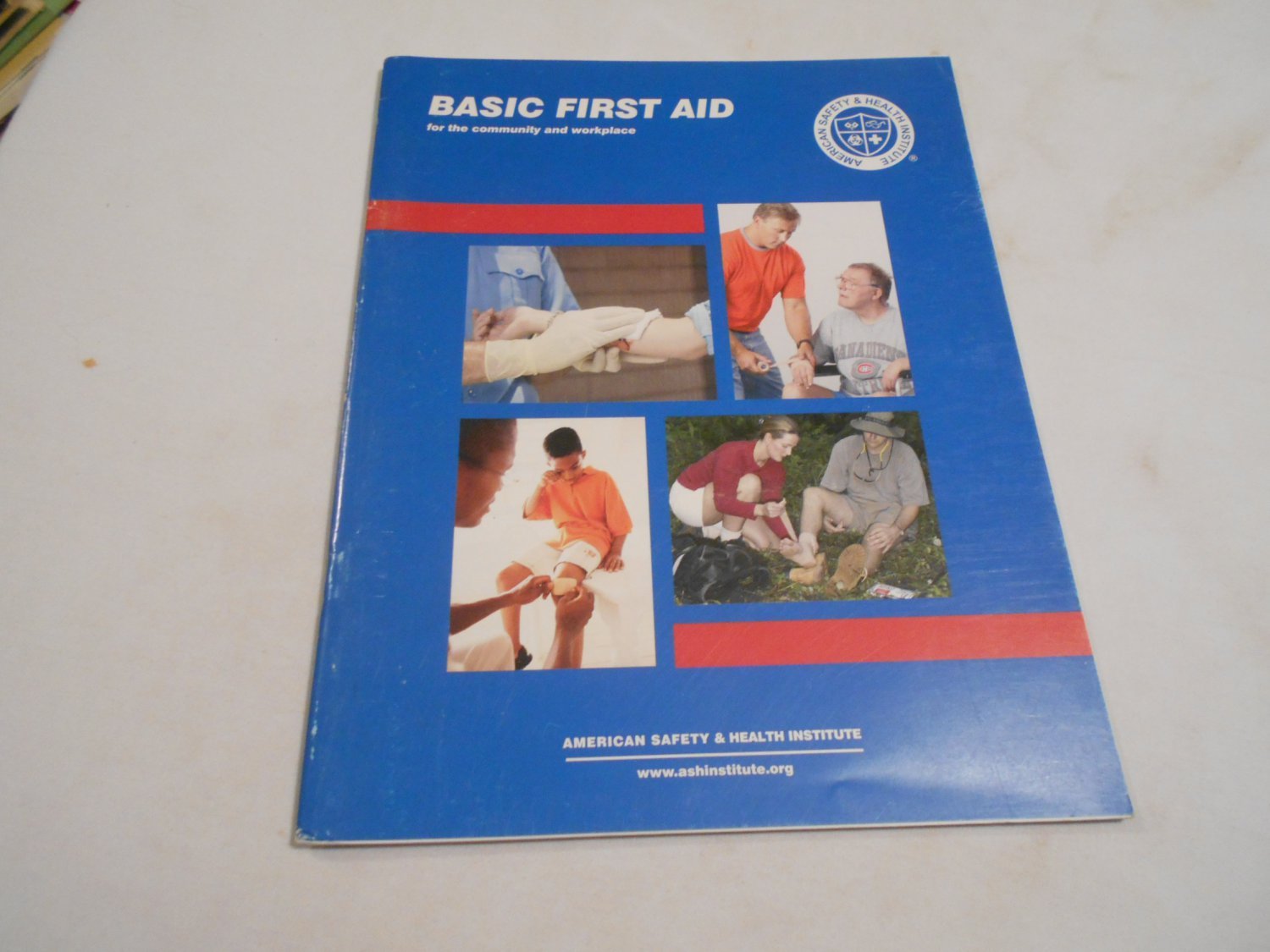 Basic First Aid for the Community and Workplace ASHI (2003) (WC4) American Safety & Health Inst PB