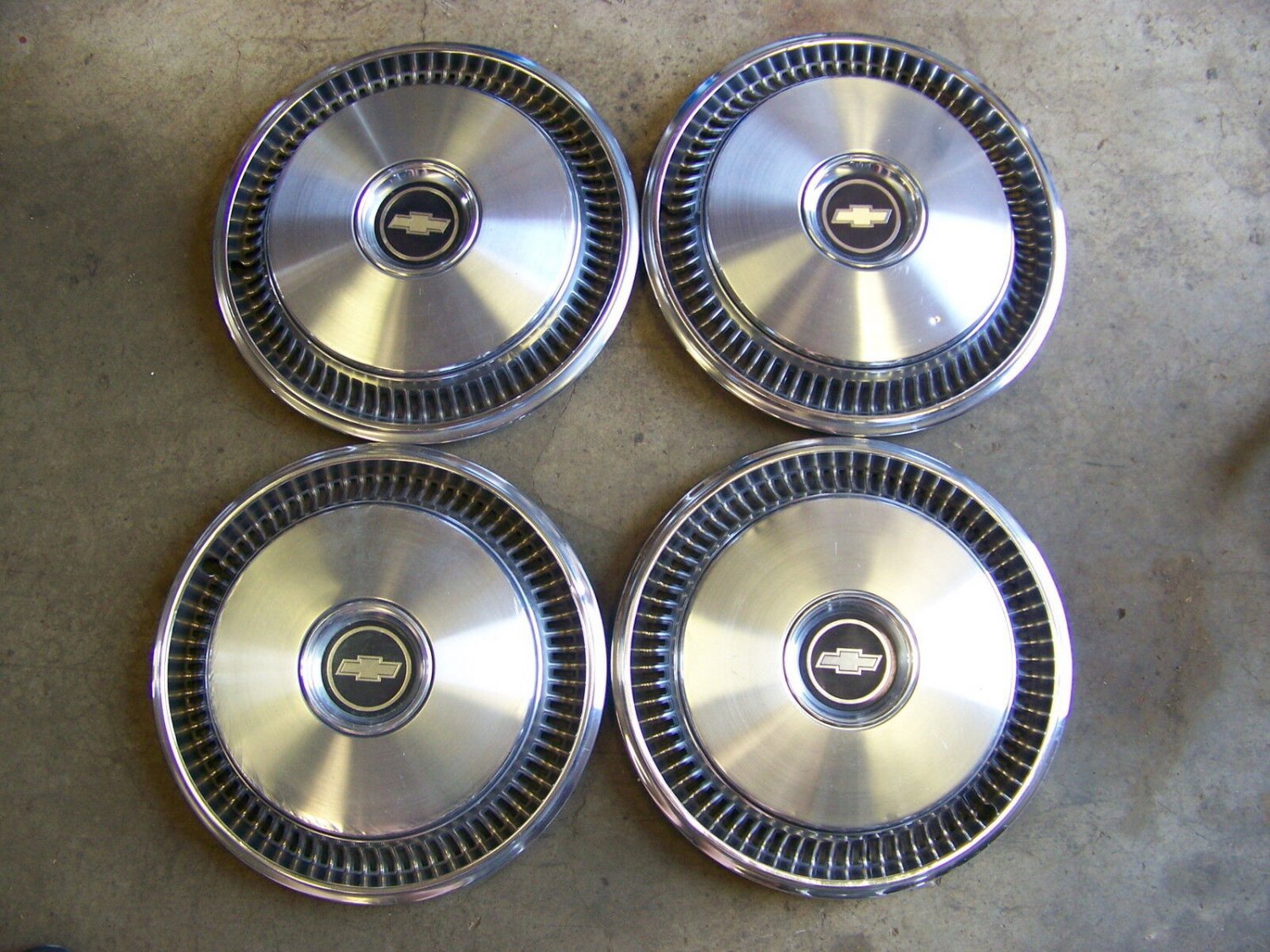 1973 CHEVROLET CHEVELLE CAMARO HUBCAPS WHEELCOVERS 14" - SET OF 4 OEM 1974