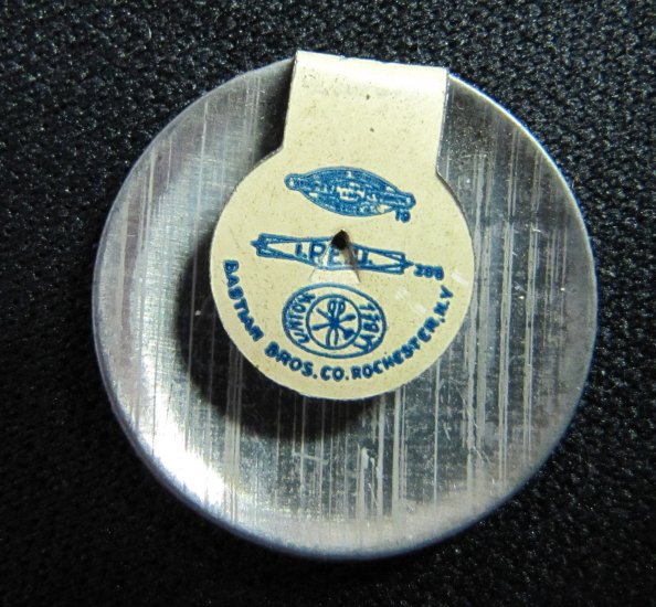 Vintage USO Metal Tab Pin .875 Inch Bastian Bros. w Union Bugs