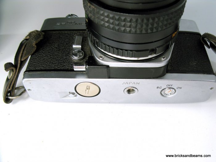 Minolta SRT MC-II 35mm SLR Film Camera with 50mm Lens and Flash