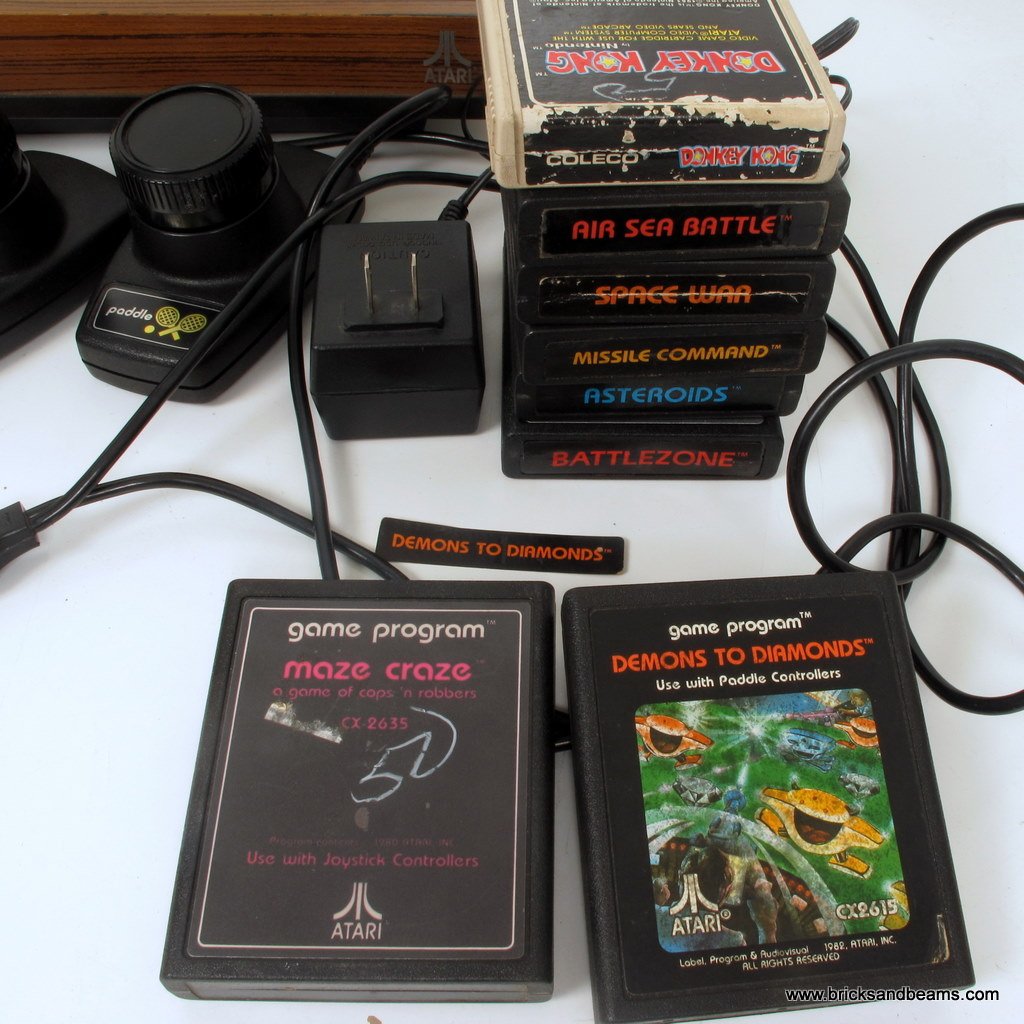 Atari 2600 Video Computer System w 8 Games 2 Joysticks Paddles CX-2600A