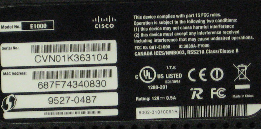 Cisco Linksys E1000 Wireless Router / 4 Port 10/100 Network Switch