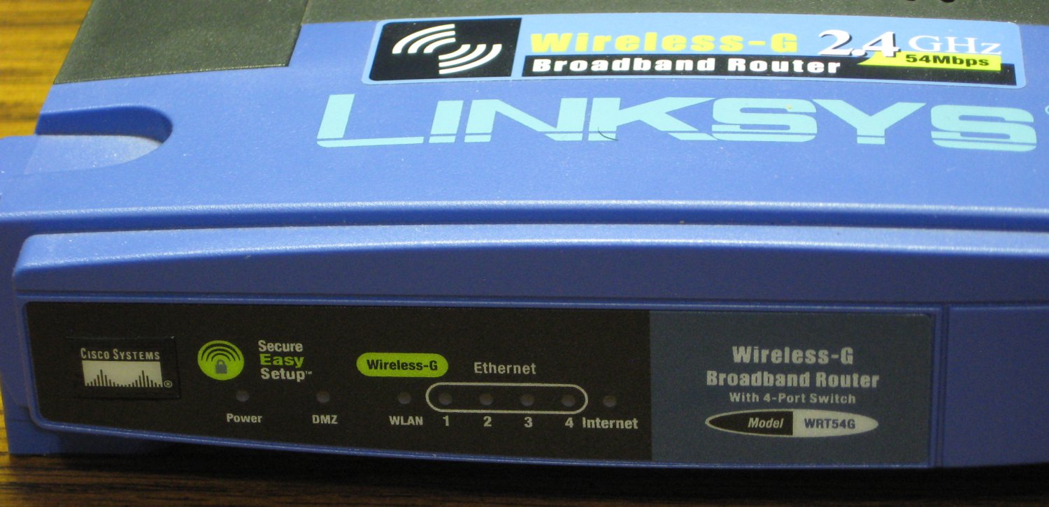 Linksys Wireless G Broadband Router / 10/100 4-Port Switch WRT54G V8