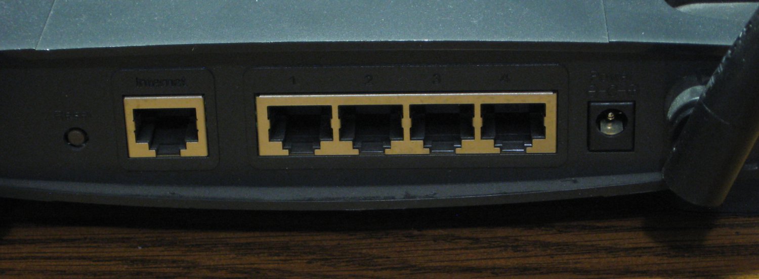 Linksys Wireless G Broadband Router / 10/100 4-Port Switch WRT54G V8