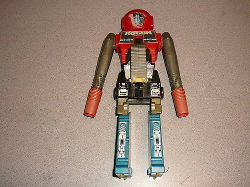 ROGUN CAP FIRING TRANSFORMER GO BOT VINTAGE TOY GUN