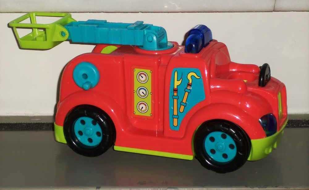 Parents Magazine Rev and Roll Fire Truck Battat Loose Used